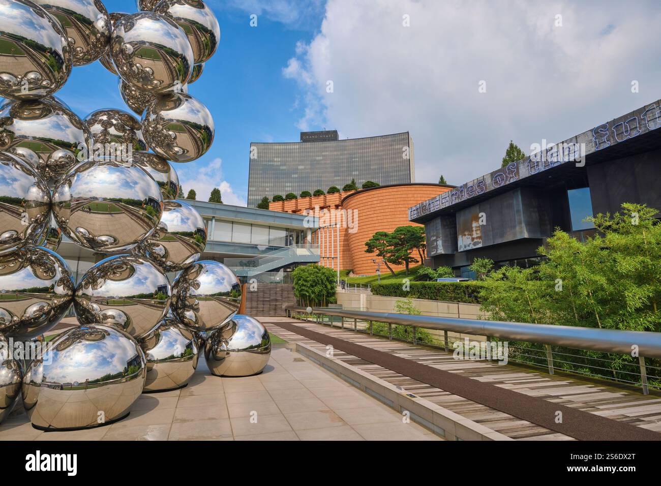 Grand Hyatt hotel and Tall Tree sculpture by Kapoor.Exterior view of the modern architecture ...