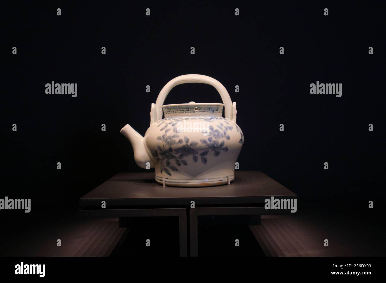 A 19th century, Joseon, porcelain ewer, tea pot with peony design. At ...