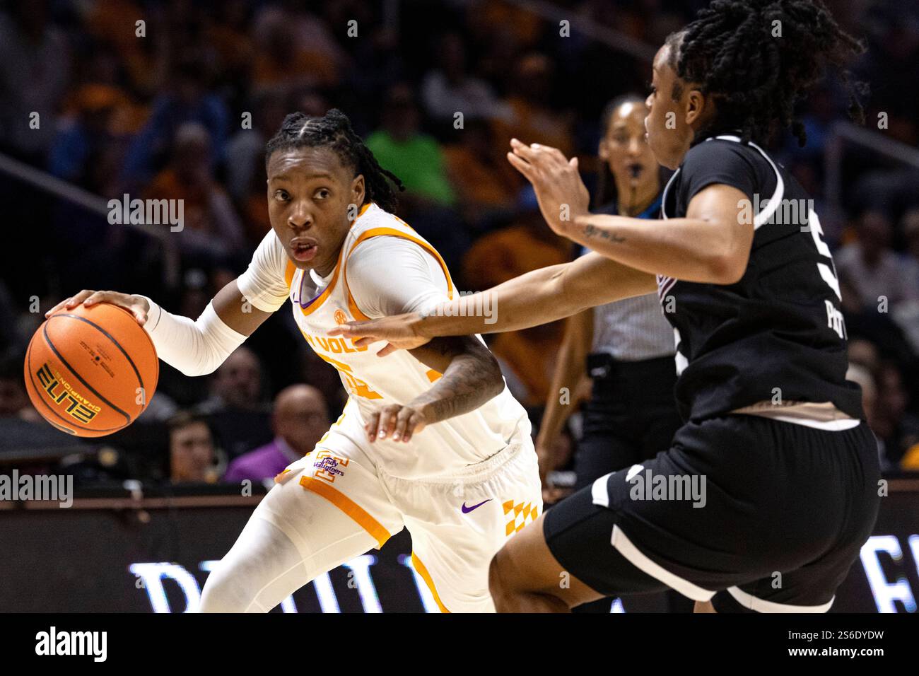 Tennessee guard Talaysia Cooper (55) drives against Mississippi State guard Chandler Prater (5 ...