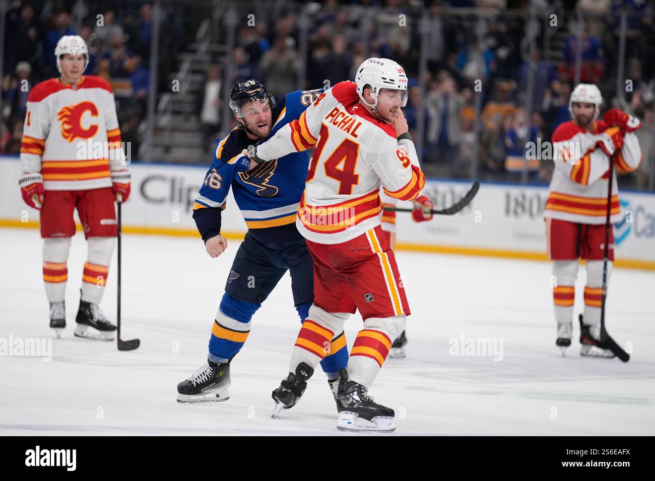 St. Louis Blues' Nathan Walker, left, and Calgary Flames' Brayden ...