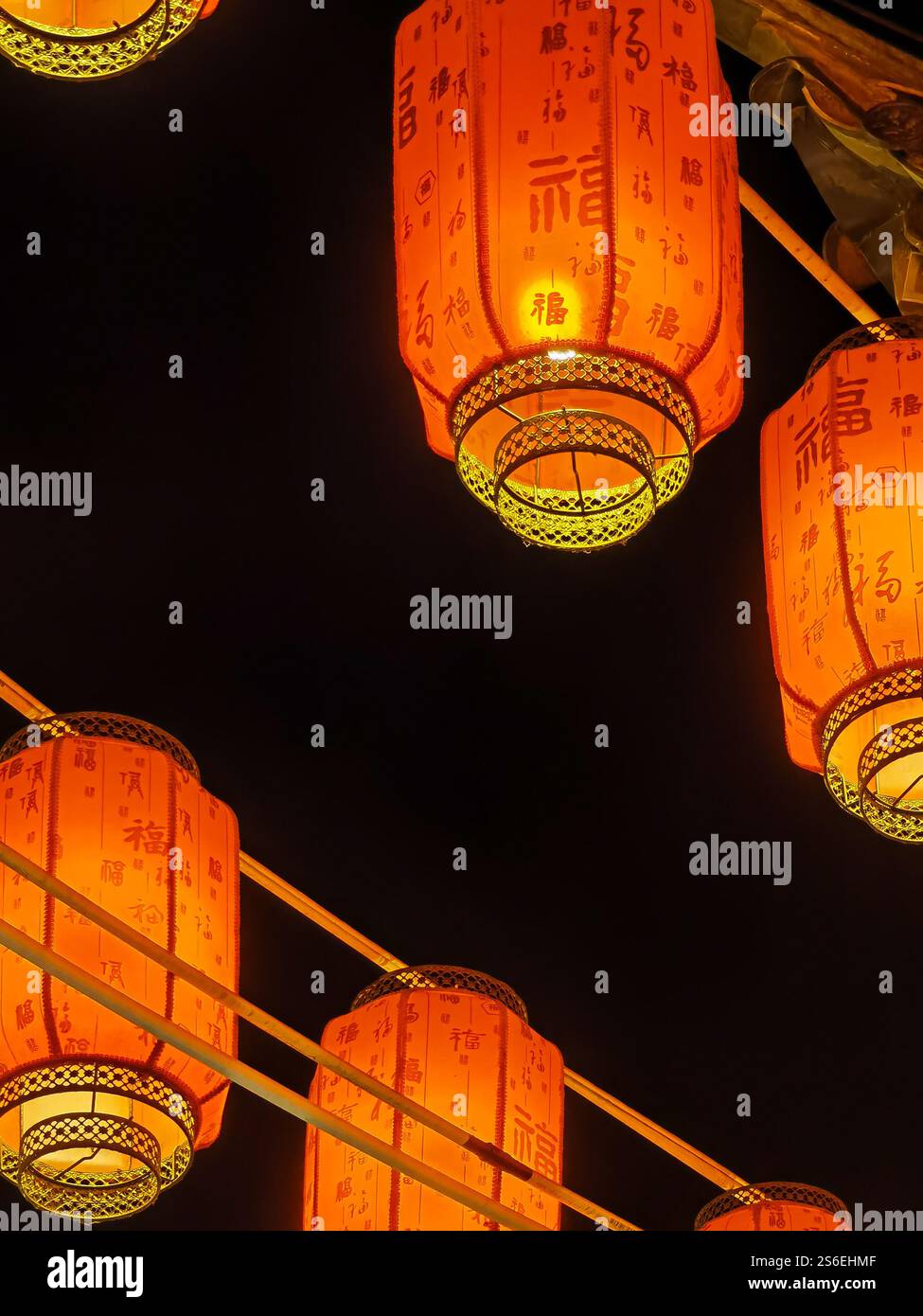 Dali, China - November 19, 2024 : Glowing orange lanterns illuminate ...