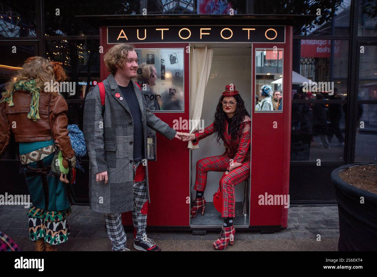 The attendees of the London Colour Walk pose for a photo by the ...