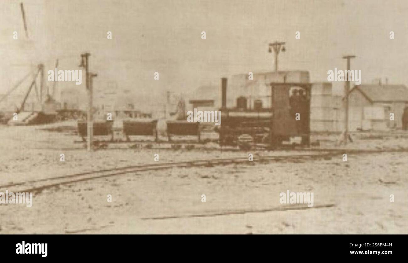 German-built 20hp tank loco hauling small skip wagons from a quarry to ...