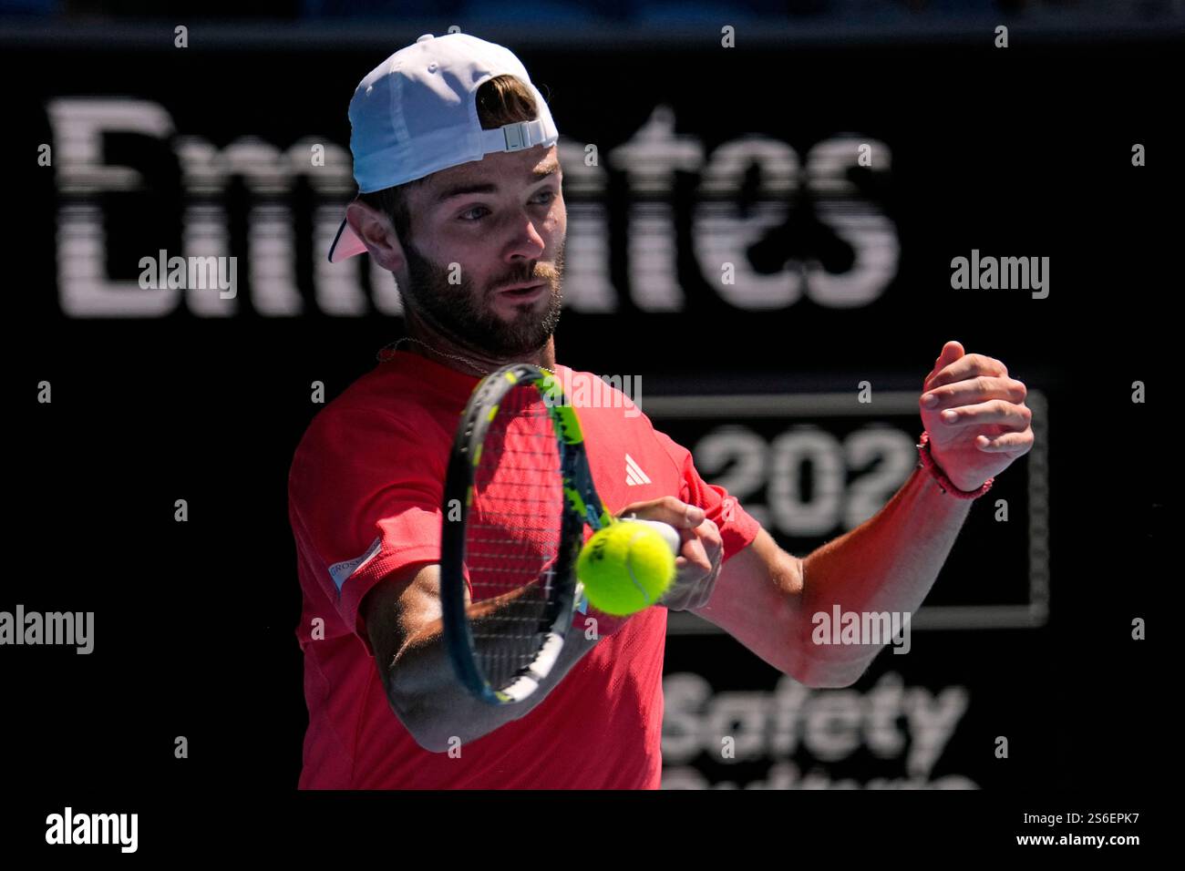 Jacob Fearnley of Britain plays a forehand return to Alexander Zverev ...