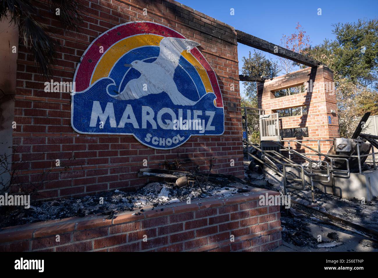 The sign of the Marquez School, remains vibrant on the exterior of the ...