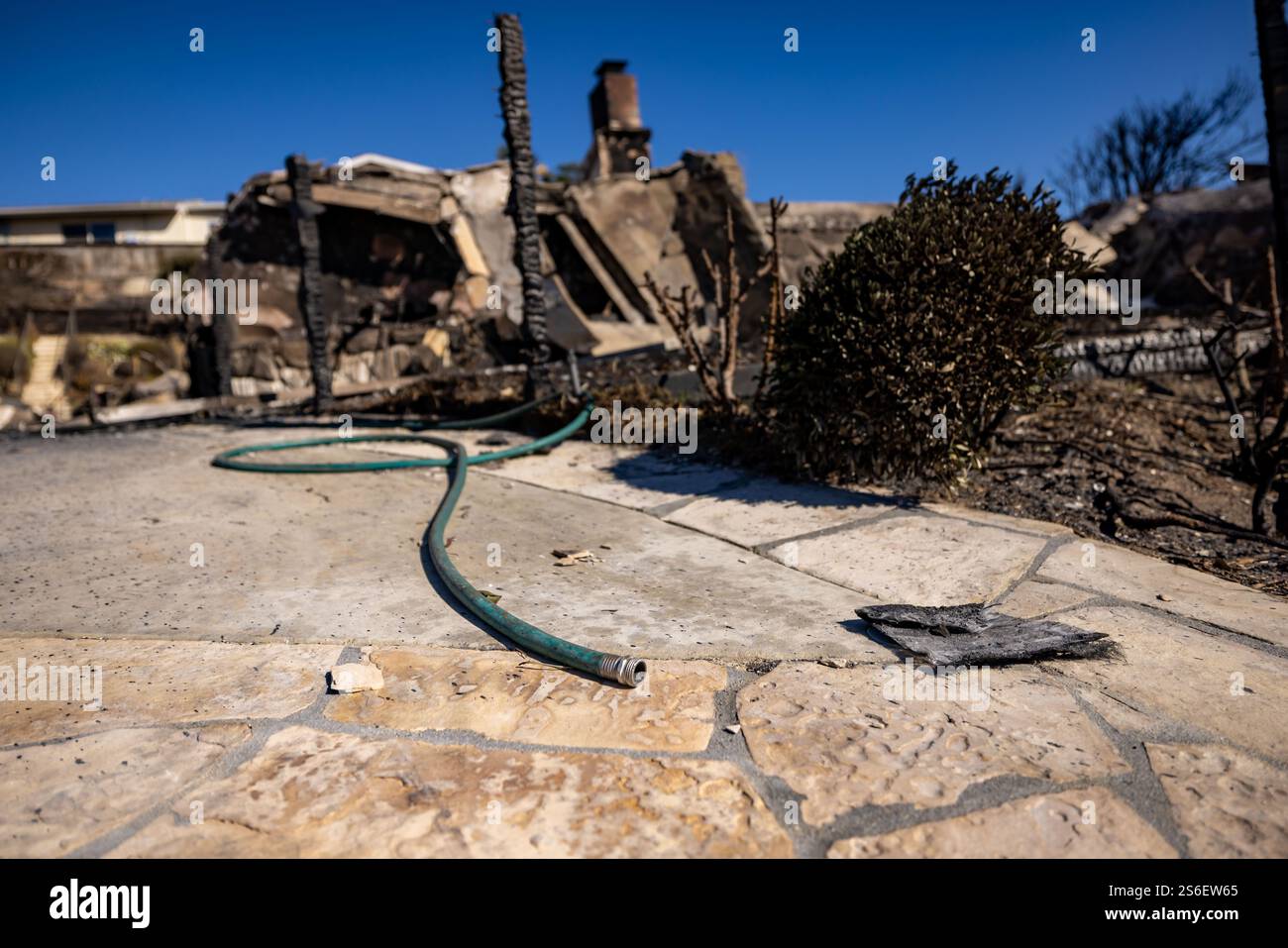 Los Angeles, United States. 15th Jan, 2025. A hose coils out from a ...