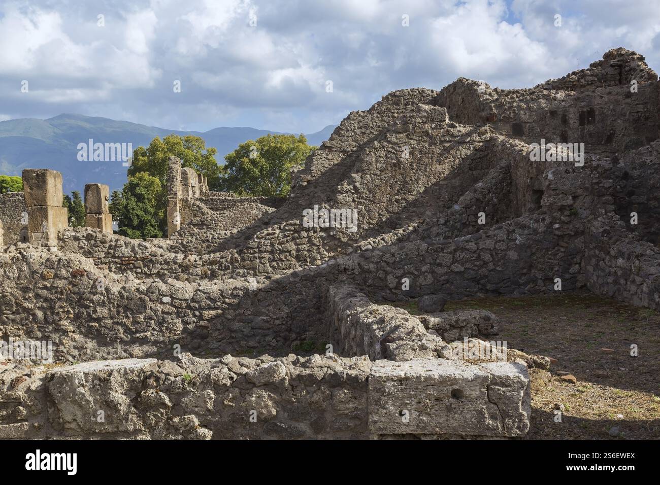 Old stone wall structures of varying heights and remnants of ...