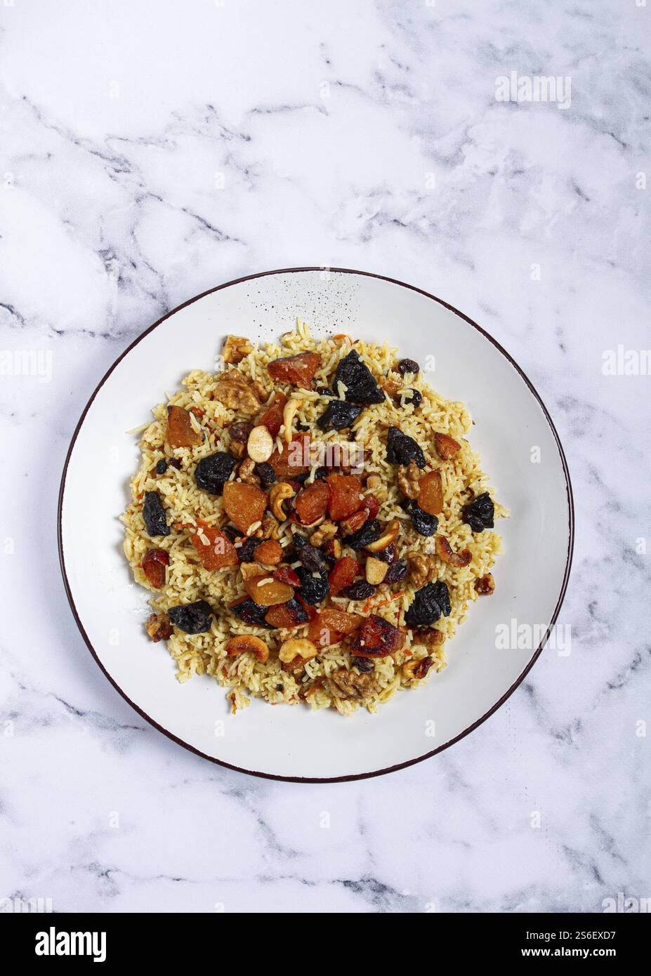 Rice dish, with the addition of dried fruits, nuts and spices of Middle ...