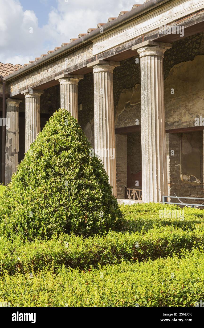 Large old building structure with columns and inner garden courtyard ...