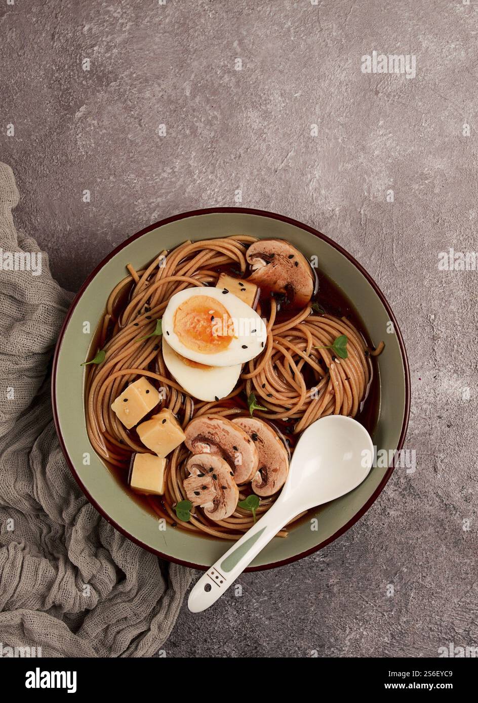 Asian soba soup, with mushrooms and egg, cheese, sesame seeds, homemade ...
