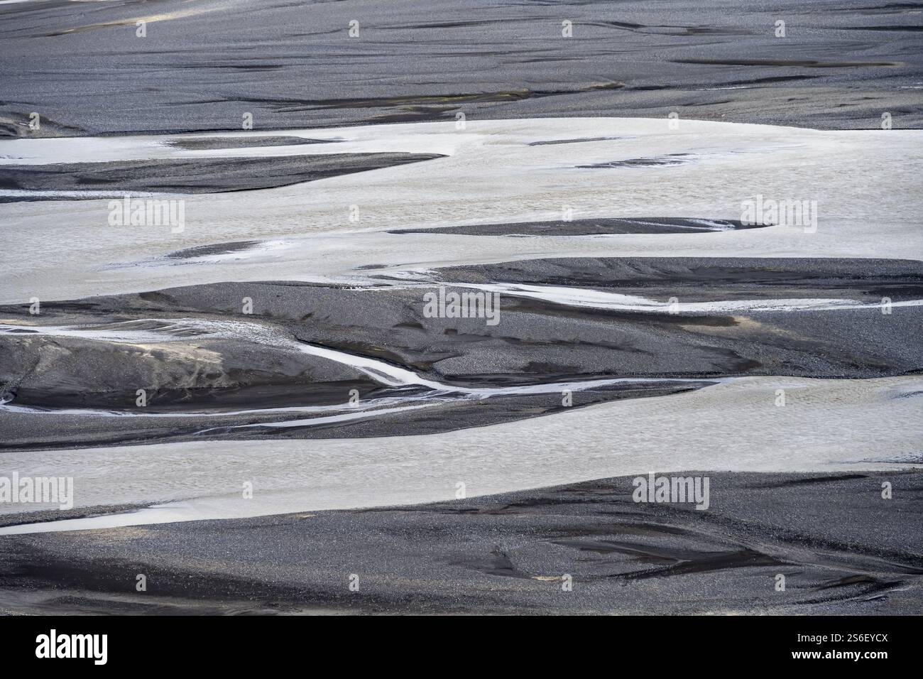 Detail, structure, river course in a gravel bed with black sand ...