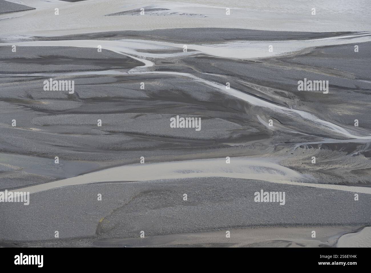 Detail, structure, river course in a gravel bed with black sand ...