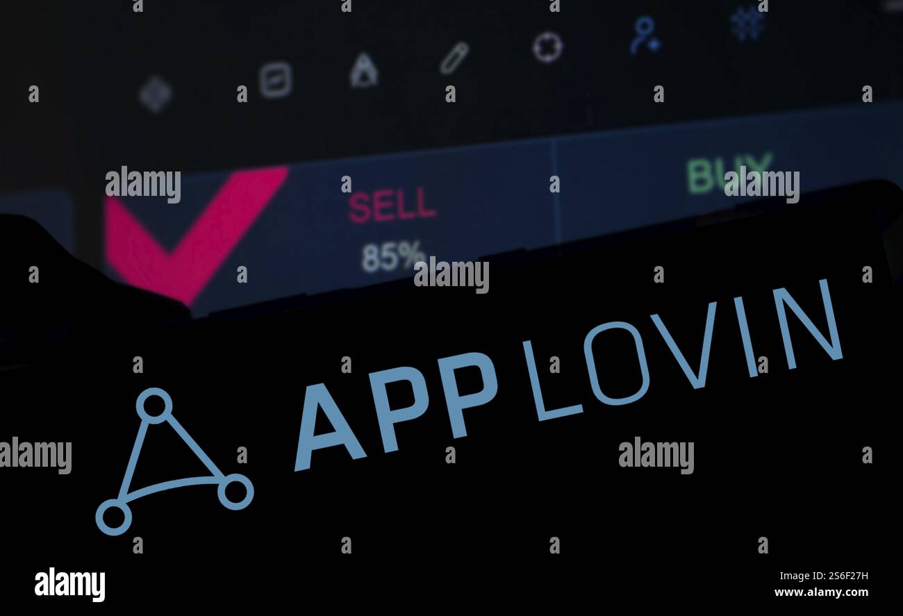 App lovin logo is displayed on smartphone. AppLovin Corporation is an ...