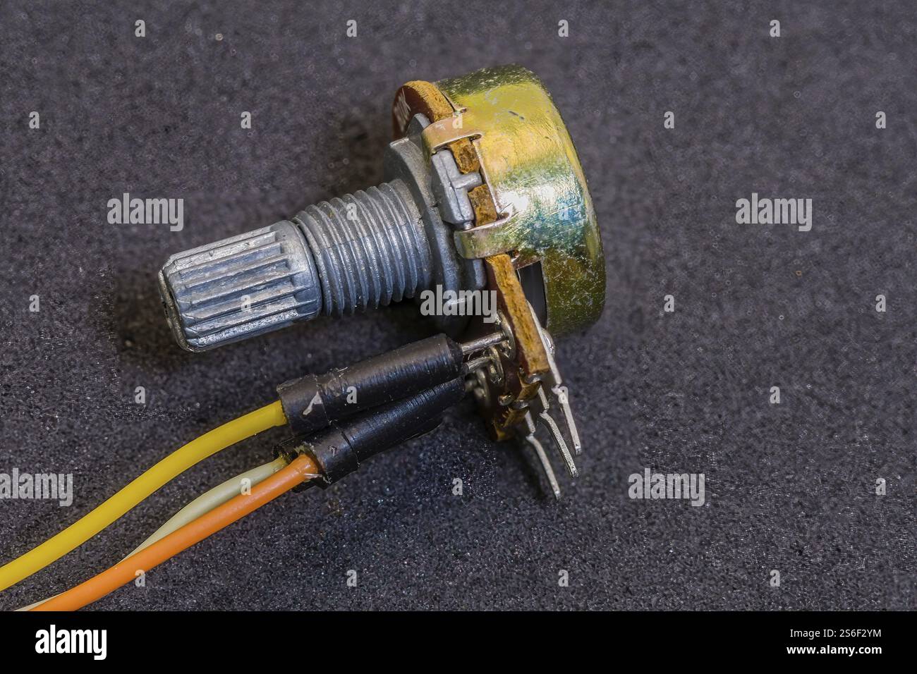 Side view of a potentiometer with metal and attached wires Stock Photo ...