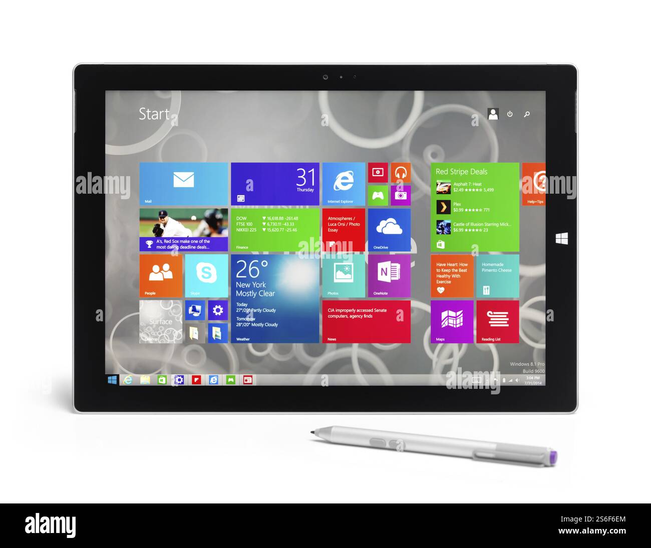 Microsoft Surface Pro 3 tablet computer with a pen isolated on white ...