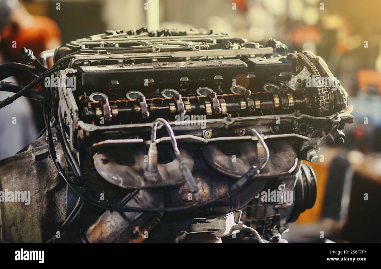 Repairing a car engine in a car service center Stock Photo - Alamy
