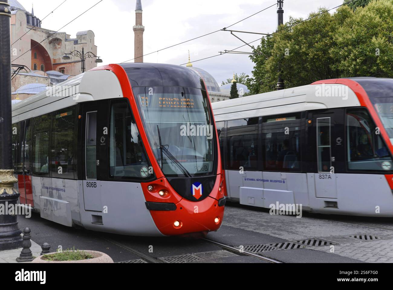 Modern white and red tram on streets of Istanbul with background ...