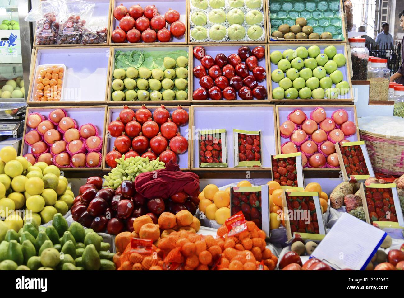 A colourful variety of fruits laid out on a market stall, Aurangabad ...