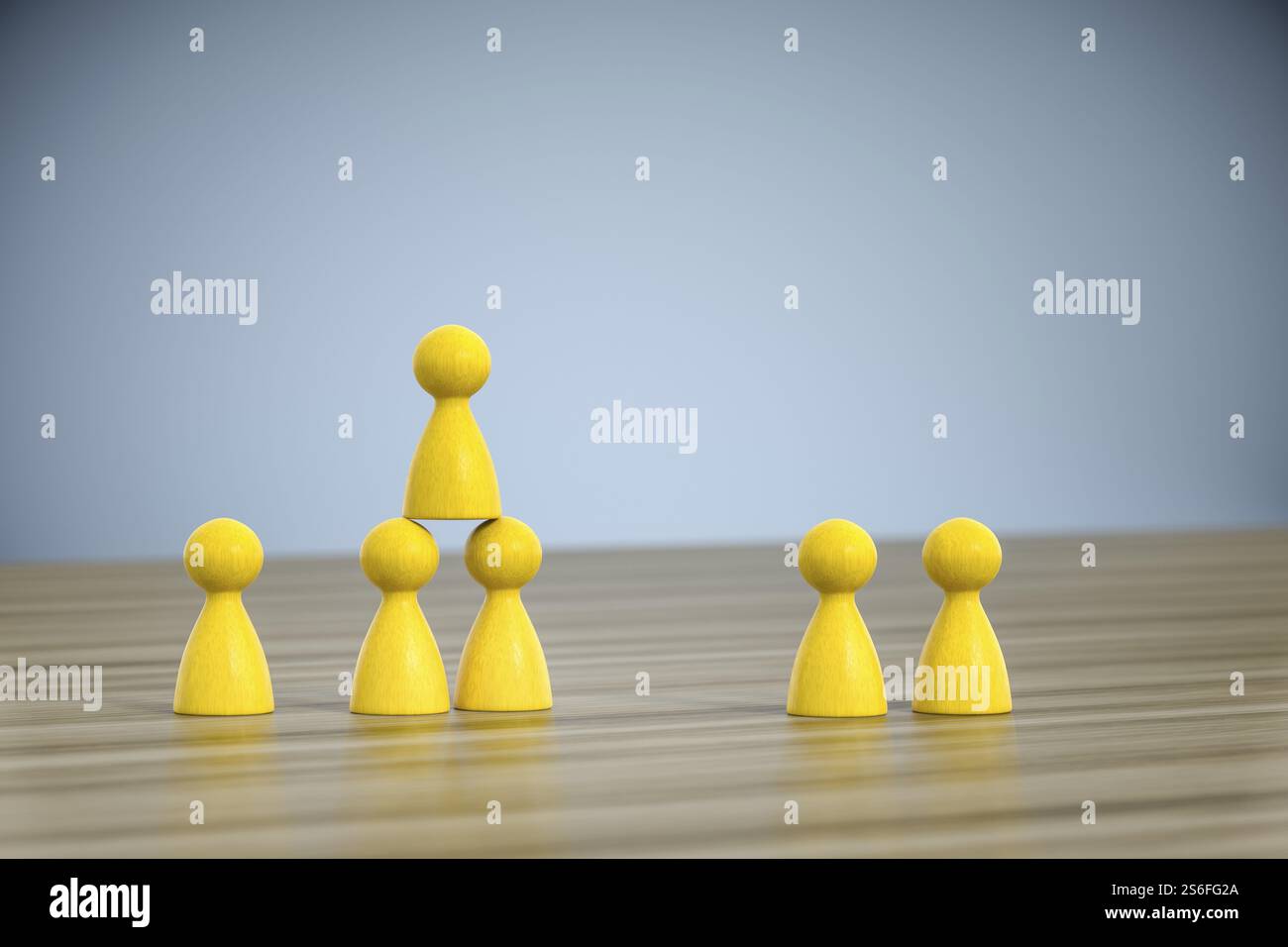 3d illustration of some game figures building a pyramid Stock Photo - Alamy