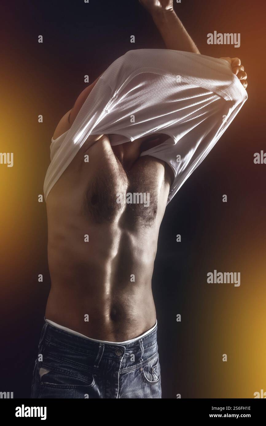 An image of a handsome muscle man side view Stock Photo - Alamy