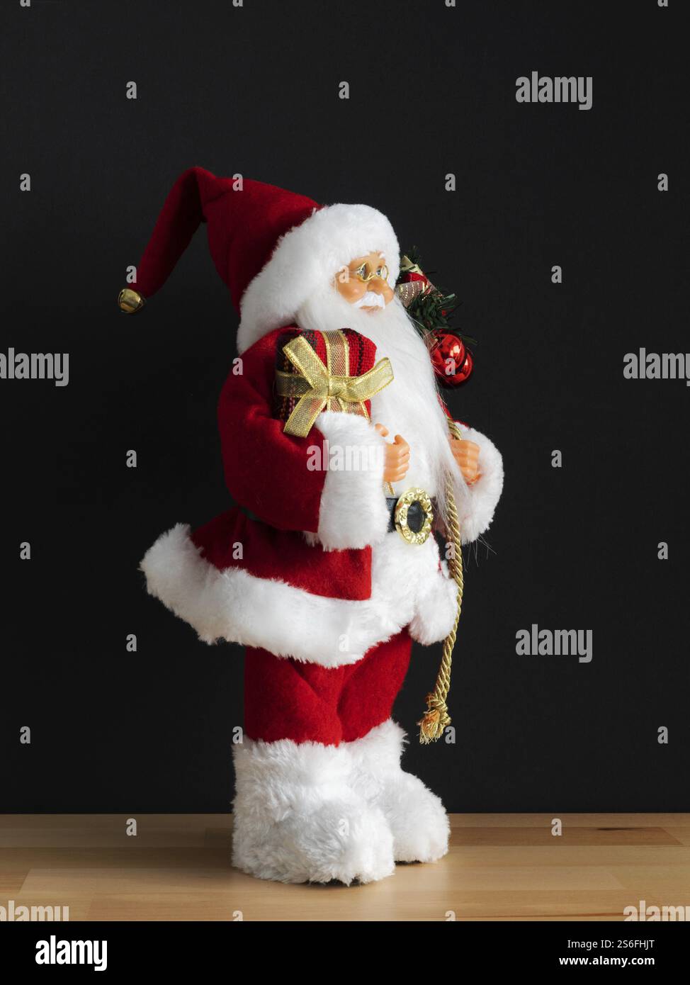 An image of a Santa Claus figure side view Stock Photo - Alamy