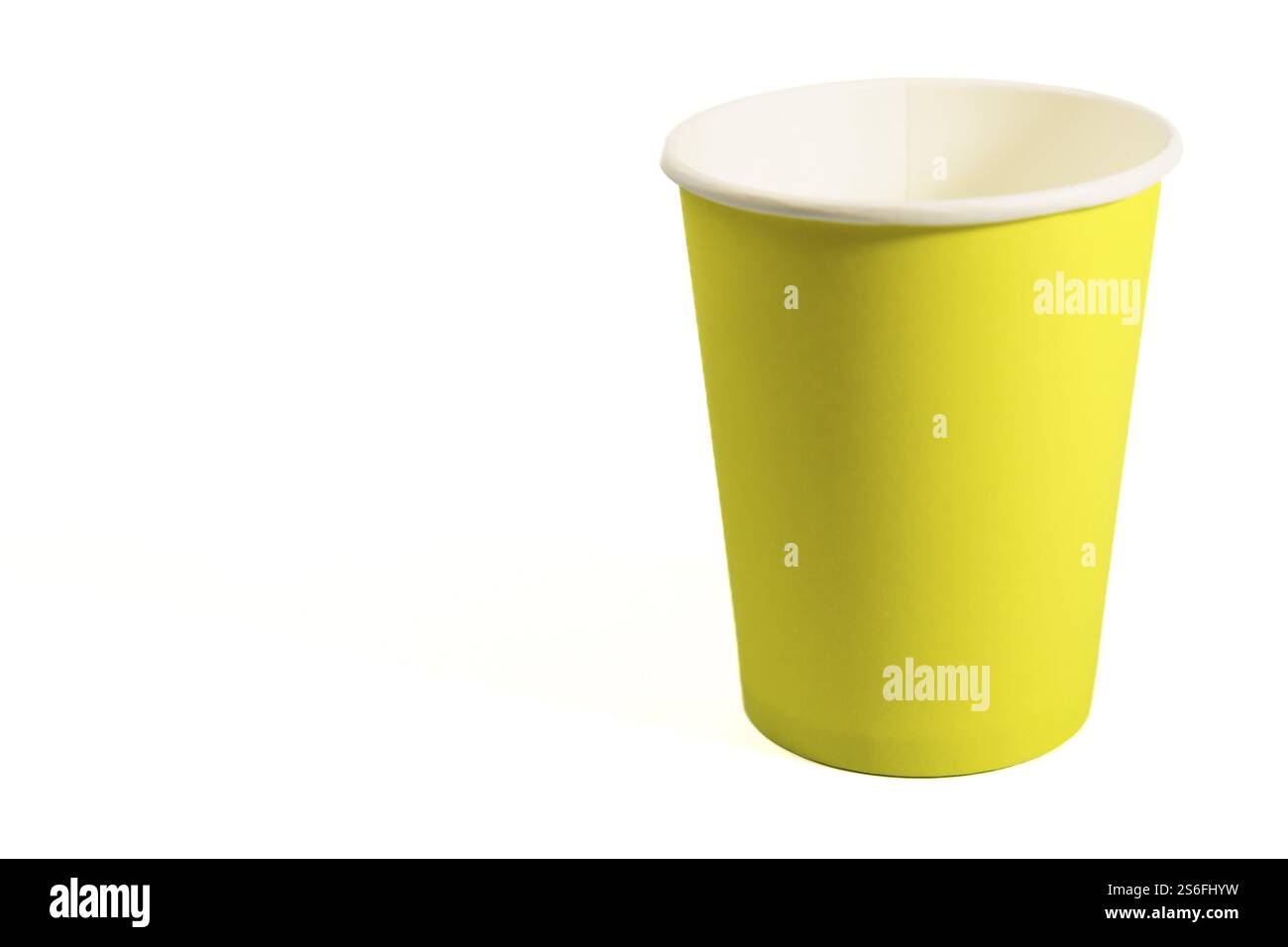 Yellow cardboard cup isolated on white background and copy space Stock ...