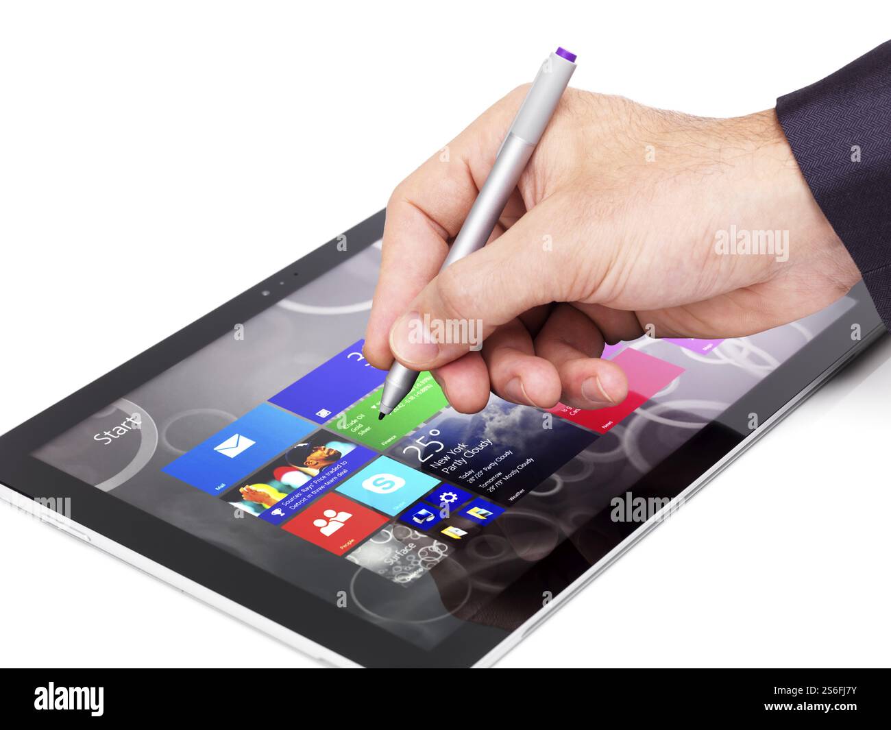 Person using Microsoft Surface Pro 3 tablet computer closeup of a hand ...