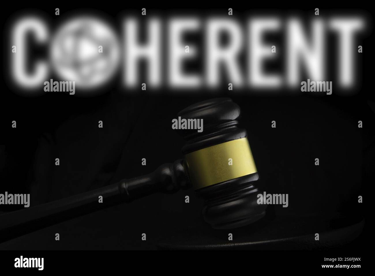 Court gavel in front of the Coherent logo. Coherent Inc is an American ...