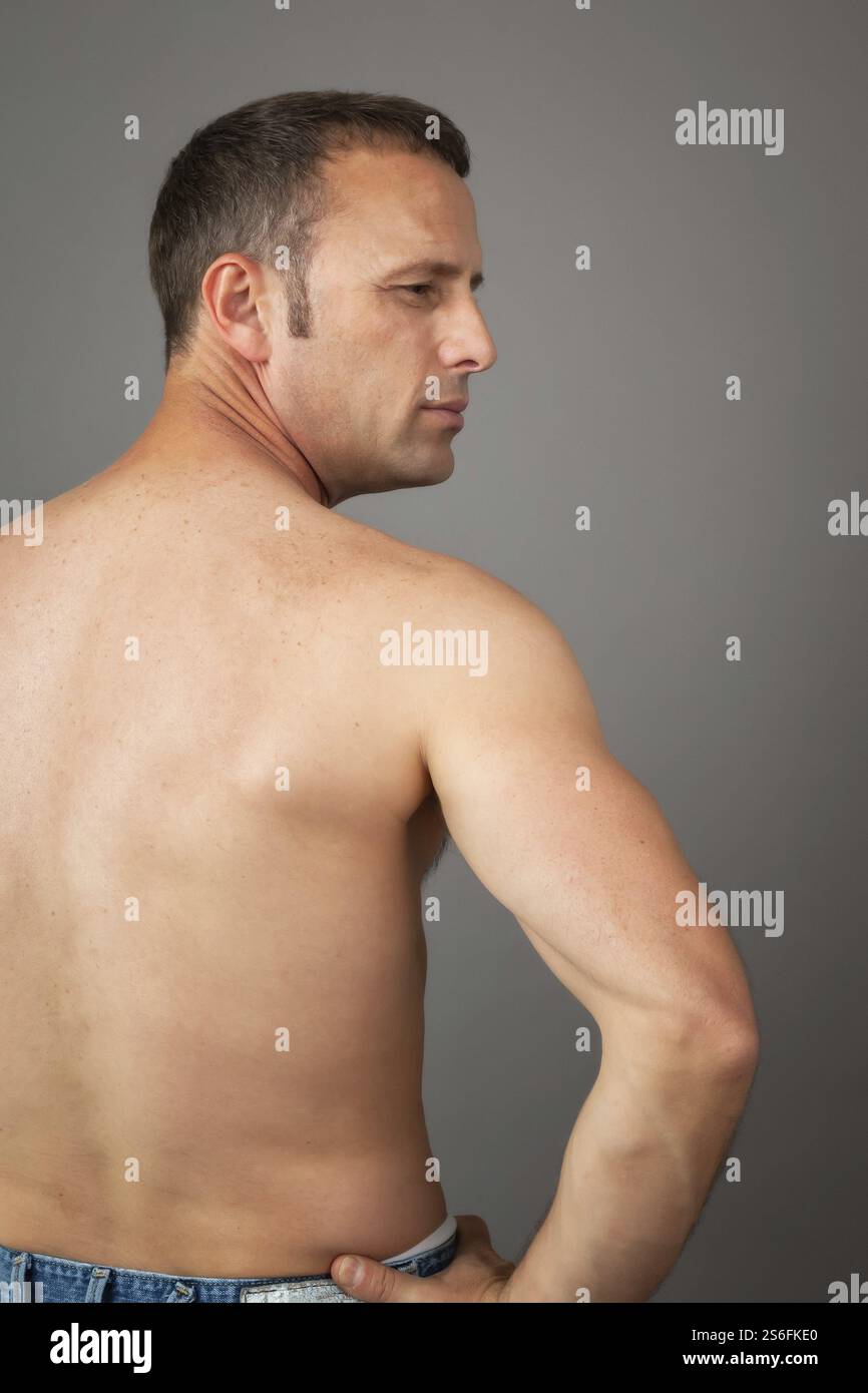 An image of a handsome muscle man back view Stock Photo - Alamy