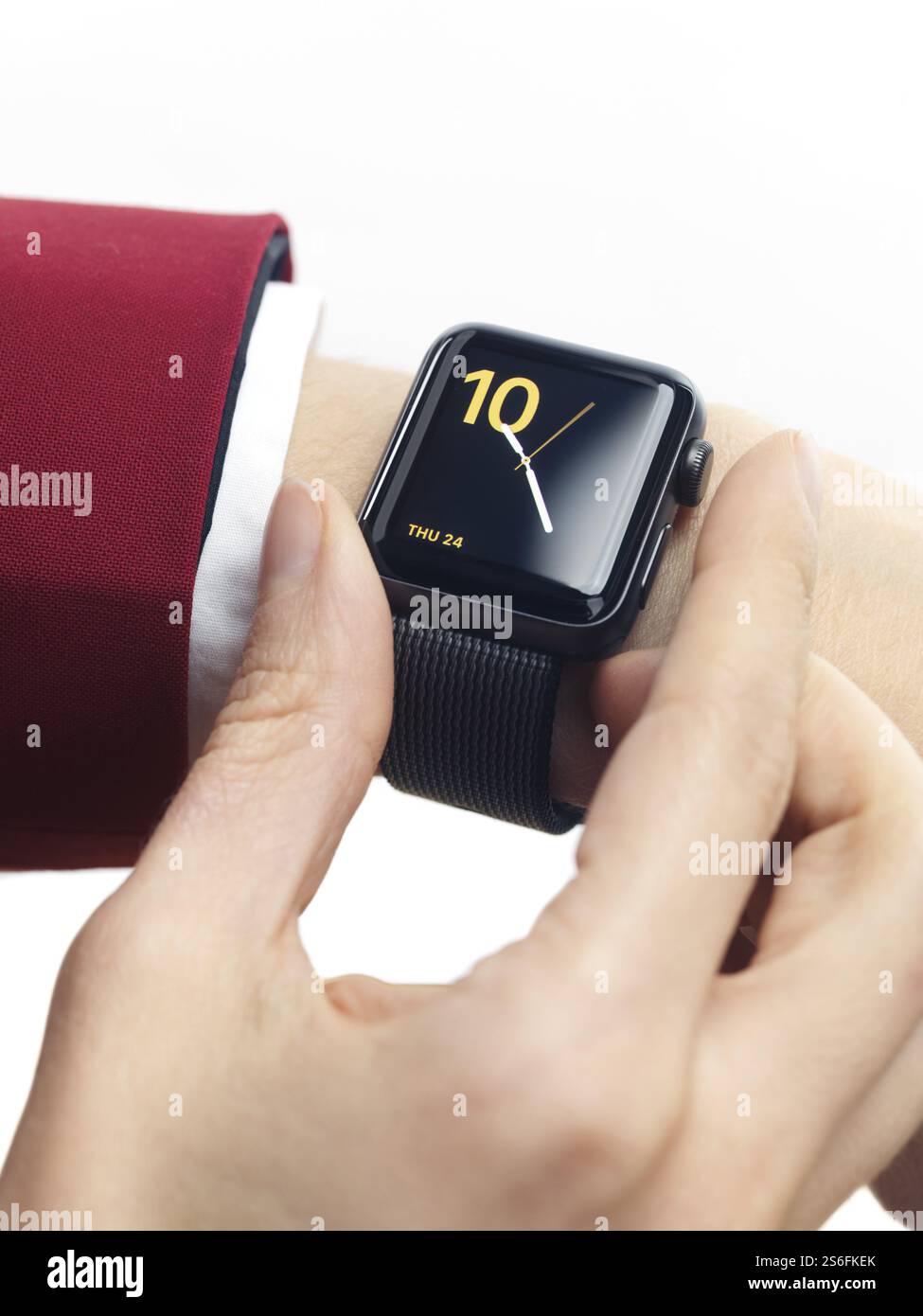 Woman hand in red suit with Apple Watch smartwatch on her wrist ...