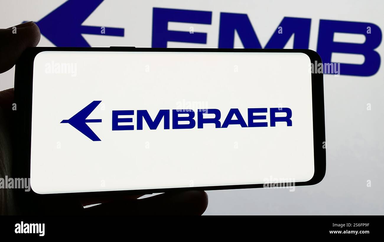 In this photo illustration, a person is holding a smartphone with the ...