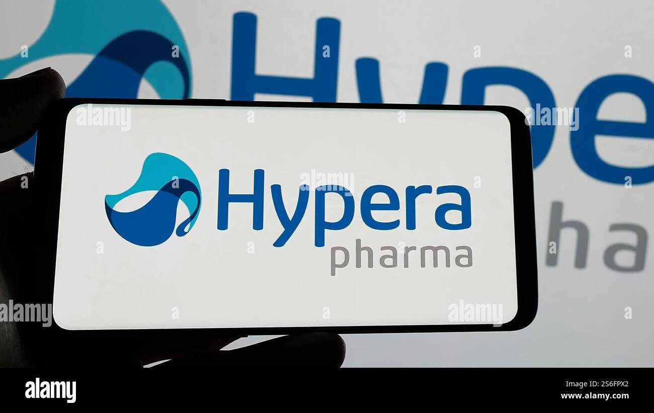 In this photo illustration, a person is holding a smartphone with the ...