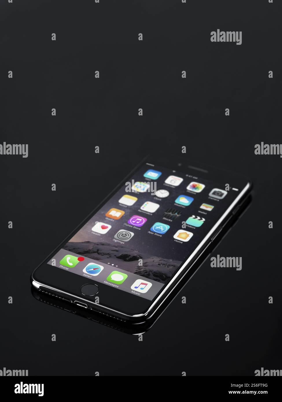 Apple iPhone 7 Plus with desktop icons on its display isolated on black ...