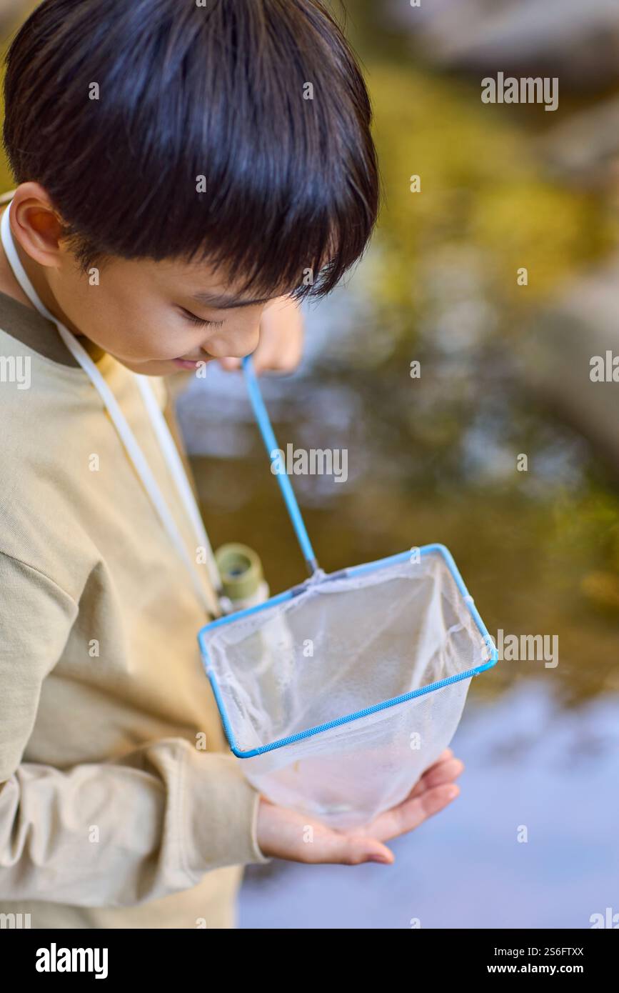 Happy child fishing boy hi-res stock photography and images - Alamy