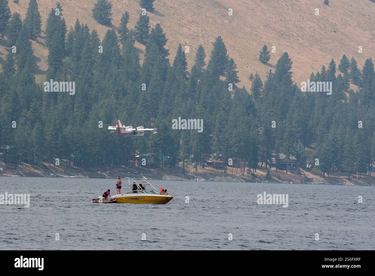 Aerial fire fighting plane ascending after scooping water from Wallowa ...