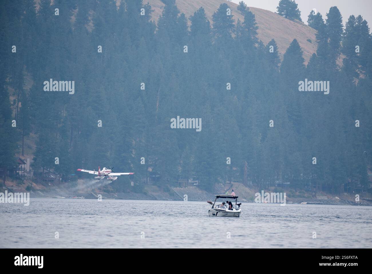 Aerial fire fighting plane ascending after scooping water from Wallowa ...