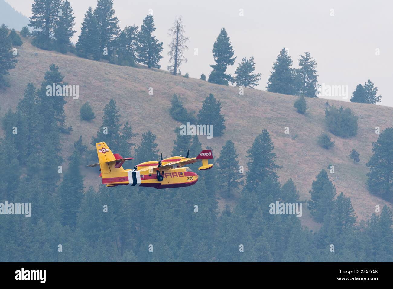 Aerial fire fighting plane ascending after scooping water from Wallowa ...