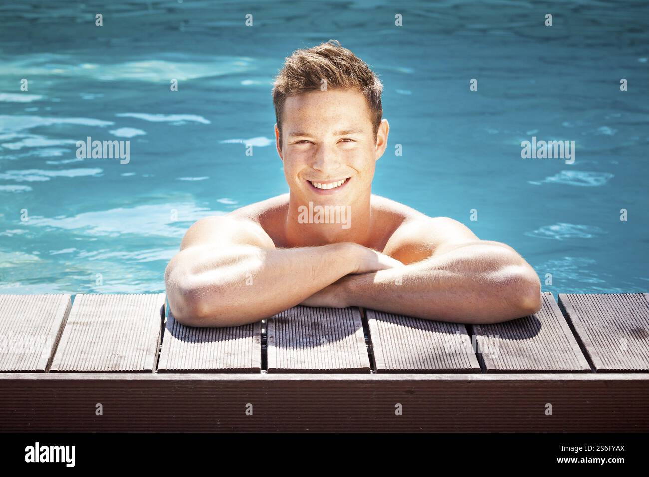 An image of a handsome man in the pool Stock Photo - Alamy