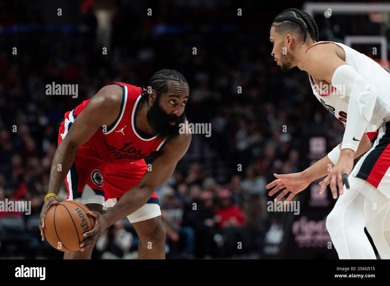 Los Angeles Clippers guard James Harden (1) looks to get around the ...