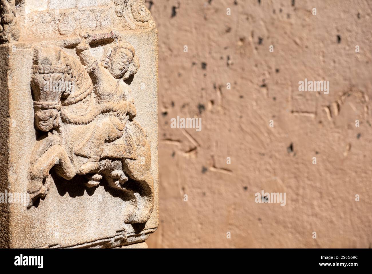 Beautiful ancient stone carvings on a pillar of an ancient Jain temple ...