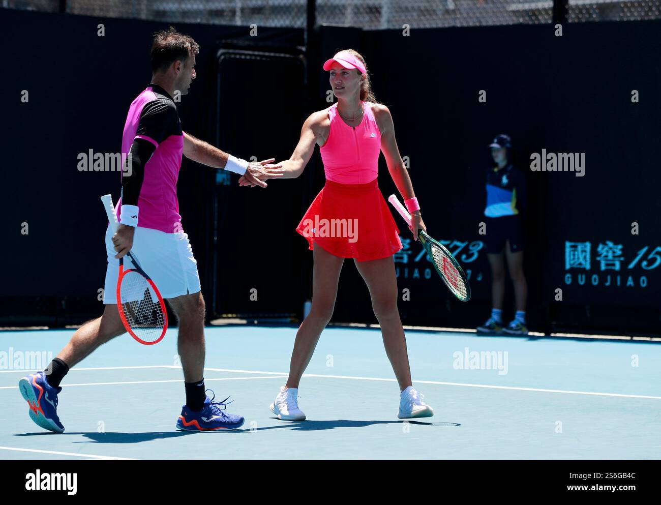 Melbourne, Australia. 17th Jan, 2025. Kristina Mladenovic (R)/Ivan Dodig celebrate scoring ...