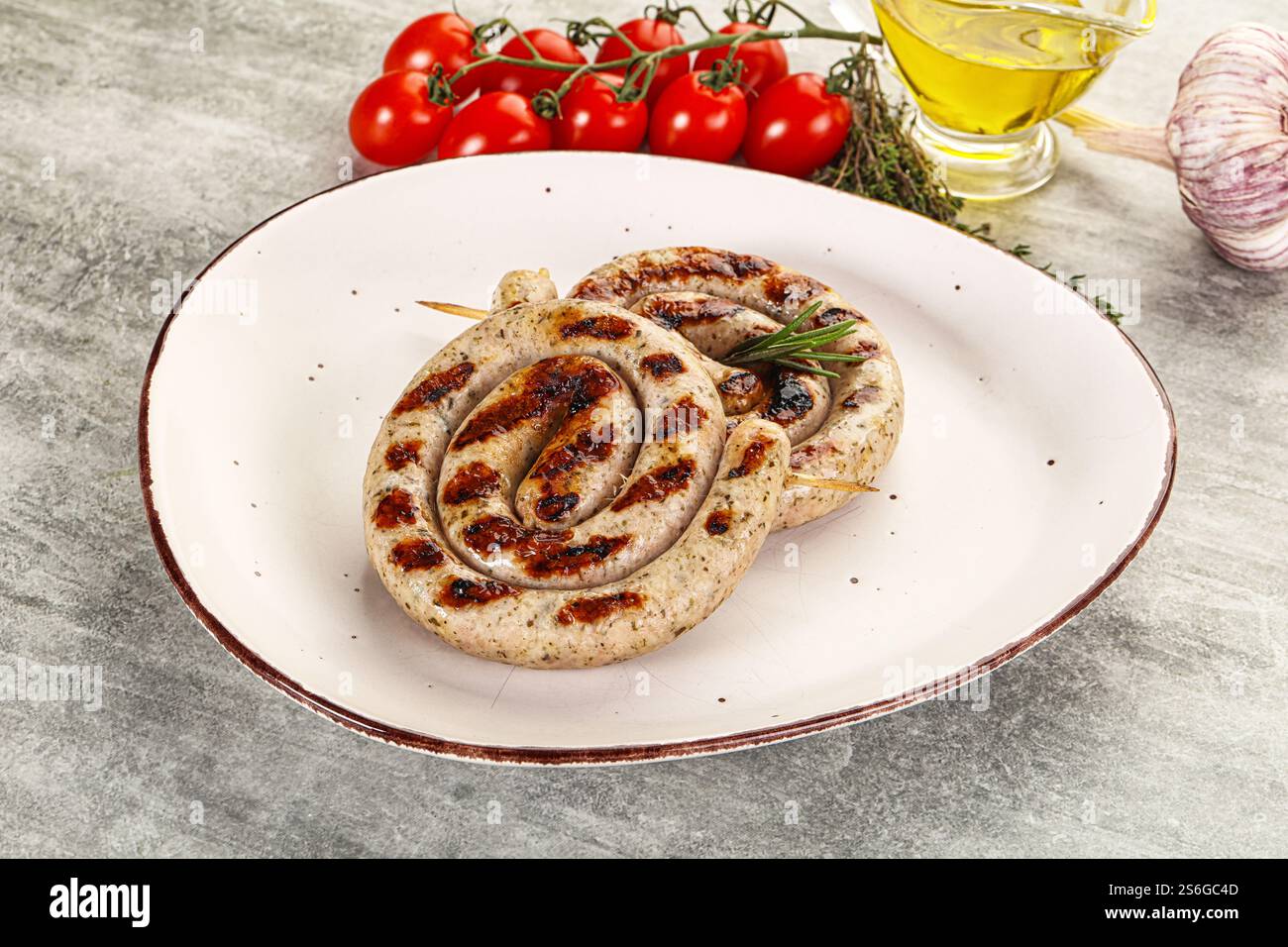 Grilled natural spiral meat juicy sausage Stock Photo - Alamy