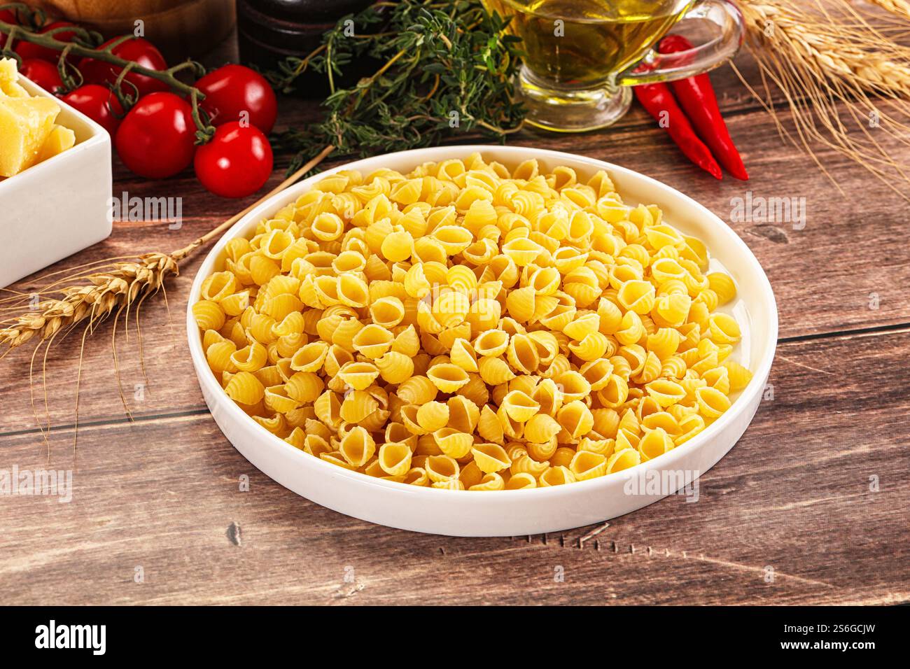 Italian cuisine - dry conchiglie shell pasta Stock Photo - Alamy