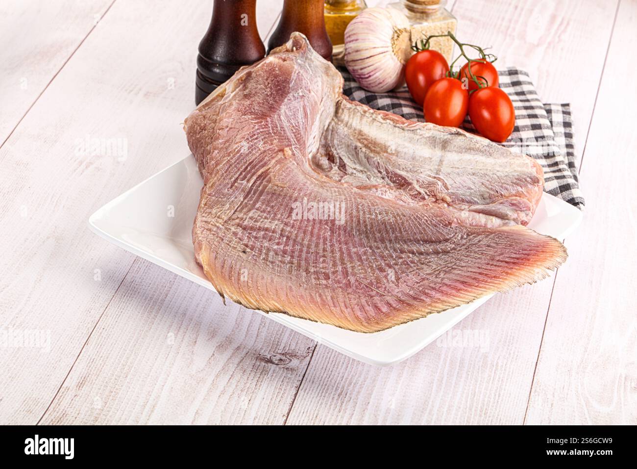 Raw uncooked stingray fish wing in thw plate Stock Photo - Alamy