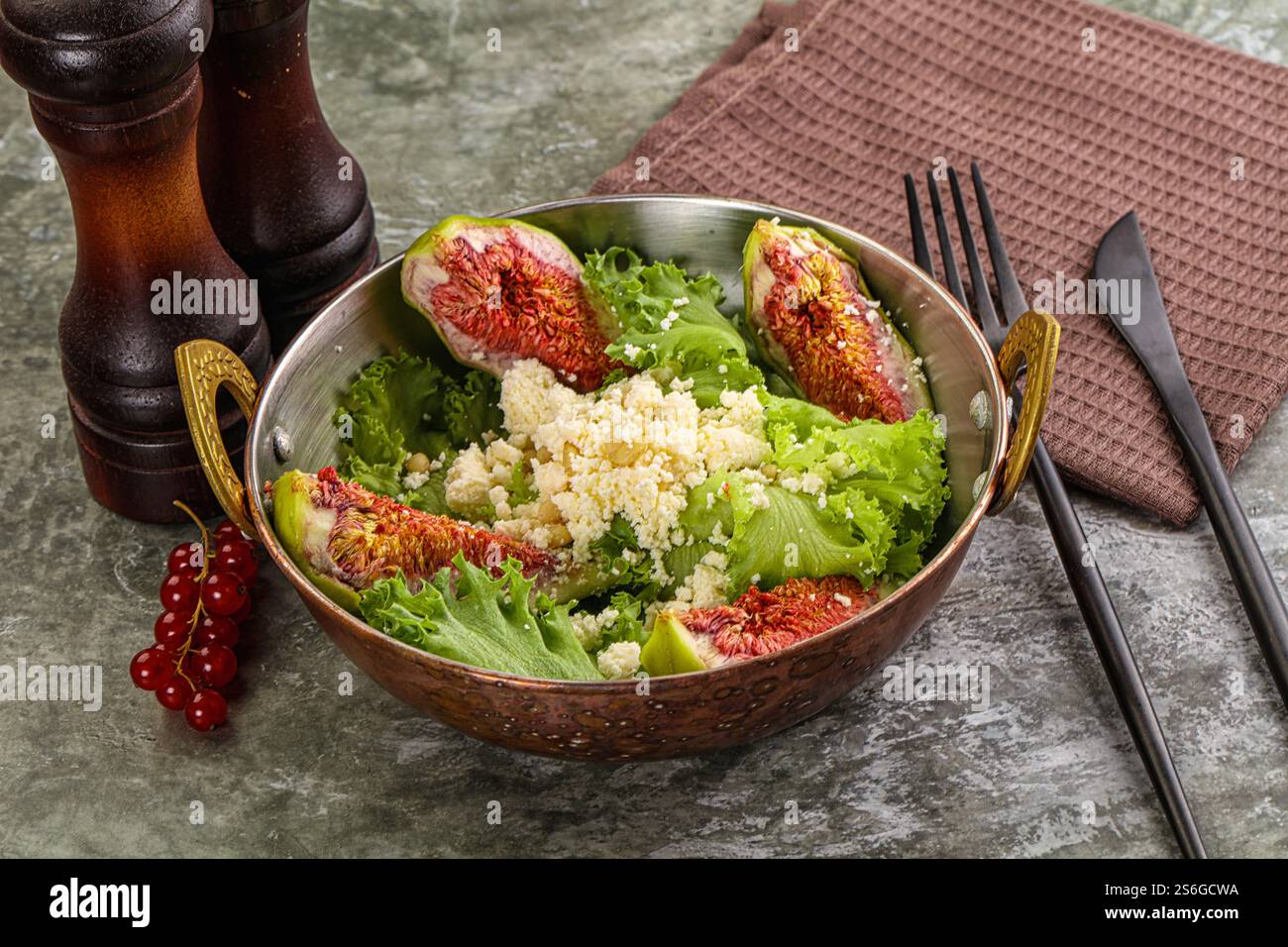 Salad with fig and sheep cottage cheese Stock Photo - Alamy