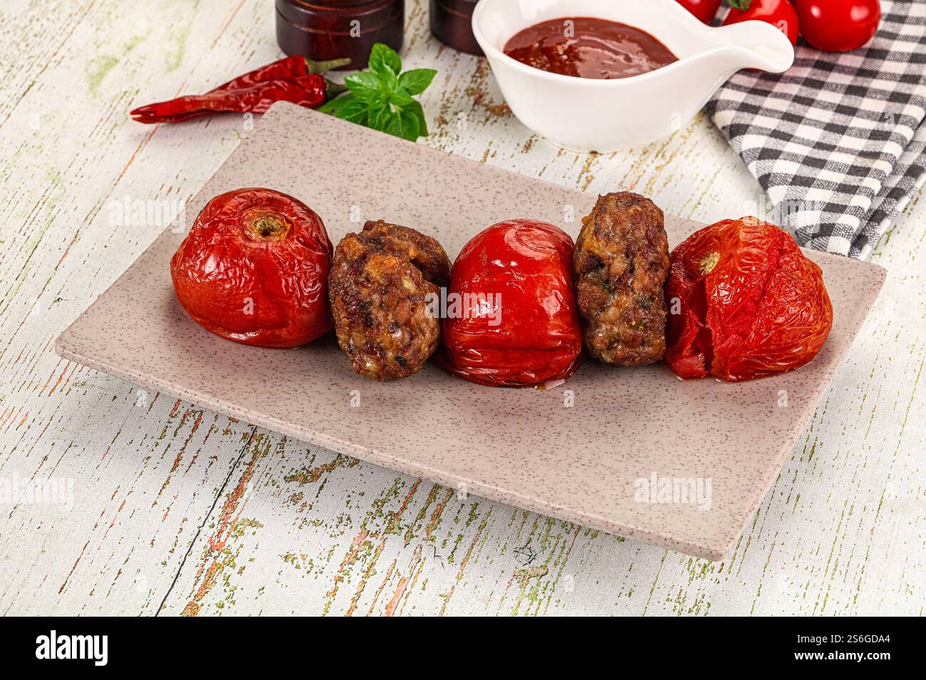 Turkish cuisine - Domatesli Kebab with minced meat and tomato Stock ...