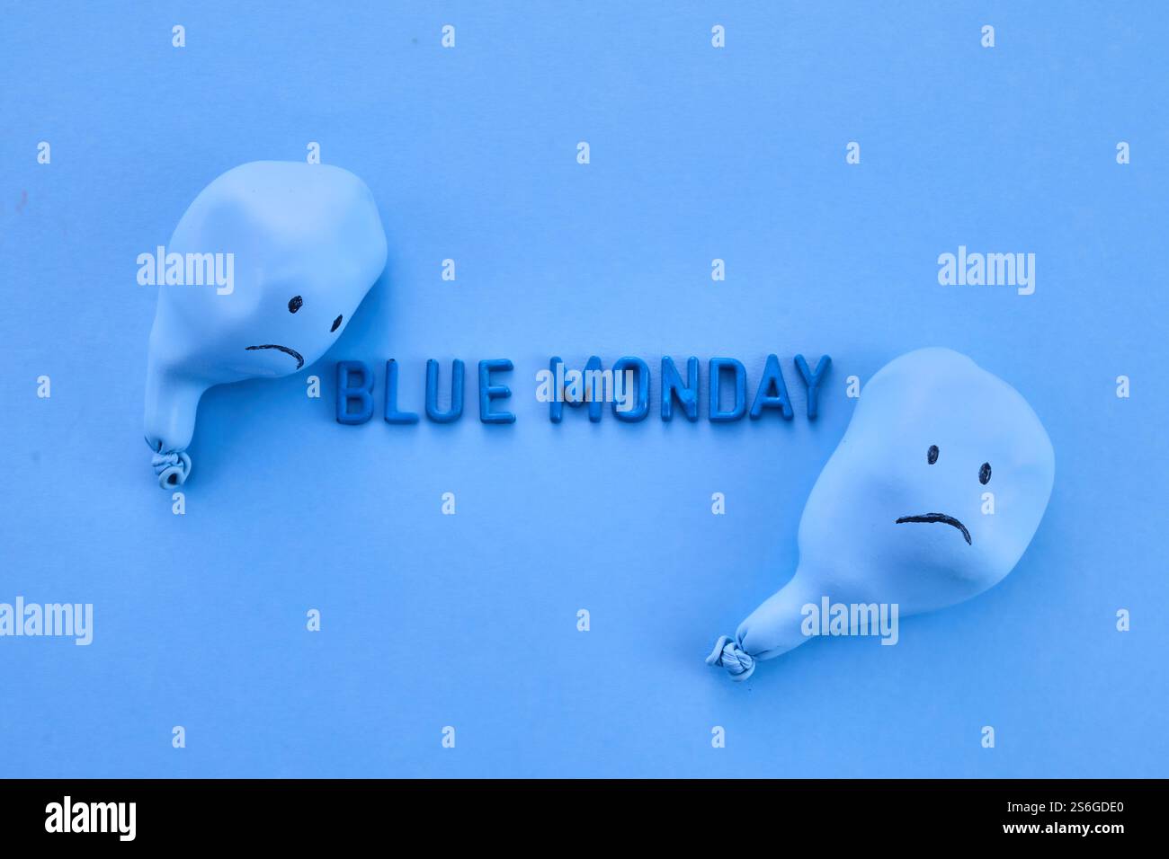 Blue Monday Balloons. A deflated balloon with a sad face Stock Photo ...