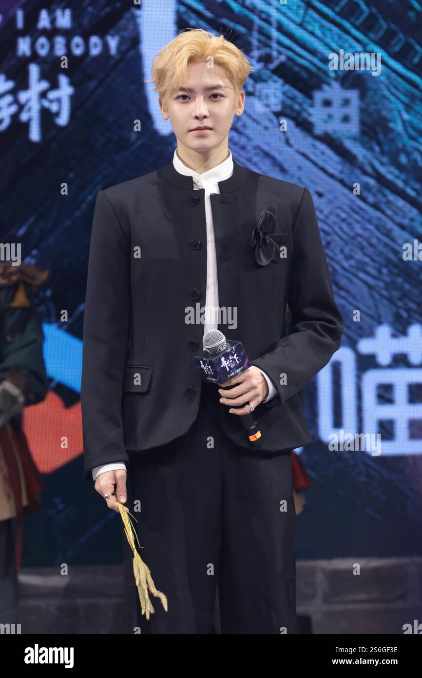 Chinese actor and singer Hou Minghao attends an activity in Beijing ...