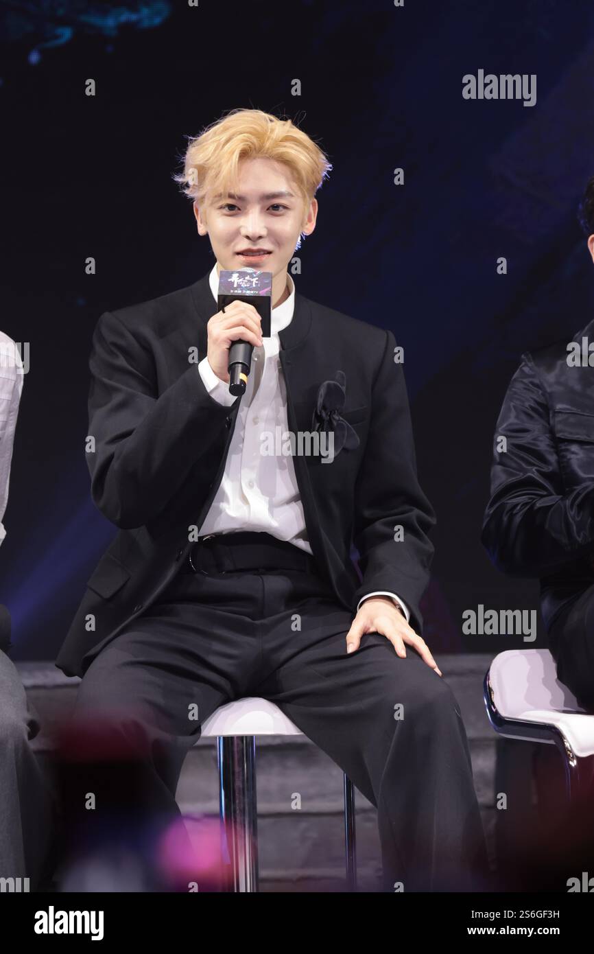 Chinese actor and singer Hou Minghao attends an activity in Beijing ...