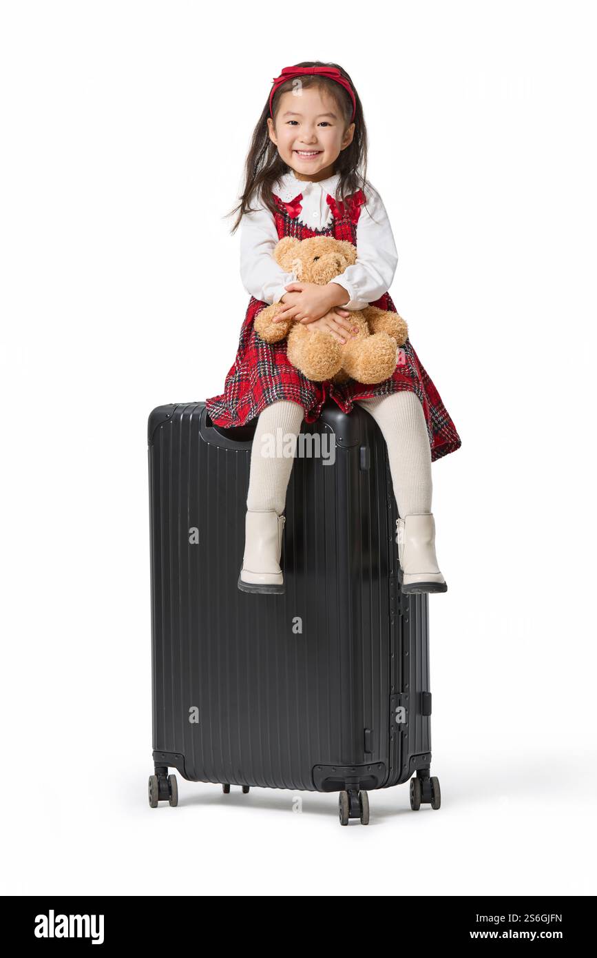 Smiling asian girl sitting Cut Out Stock Images & Pictures - Alamy